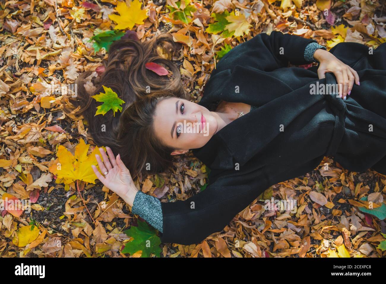 Caucasian woman laying on the ground hi-res stock photography and ...