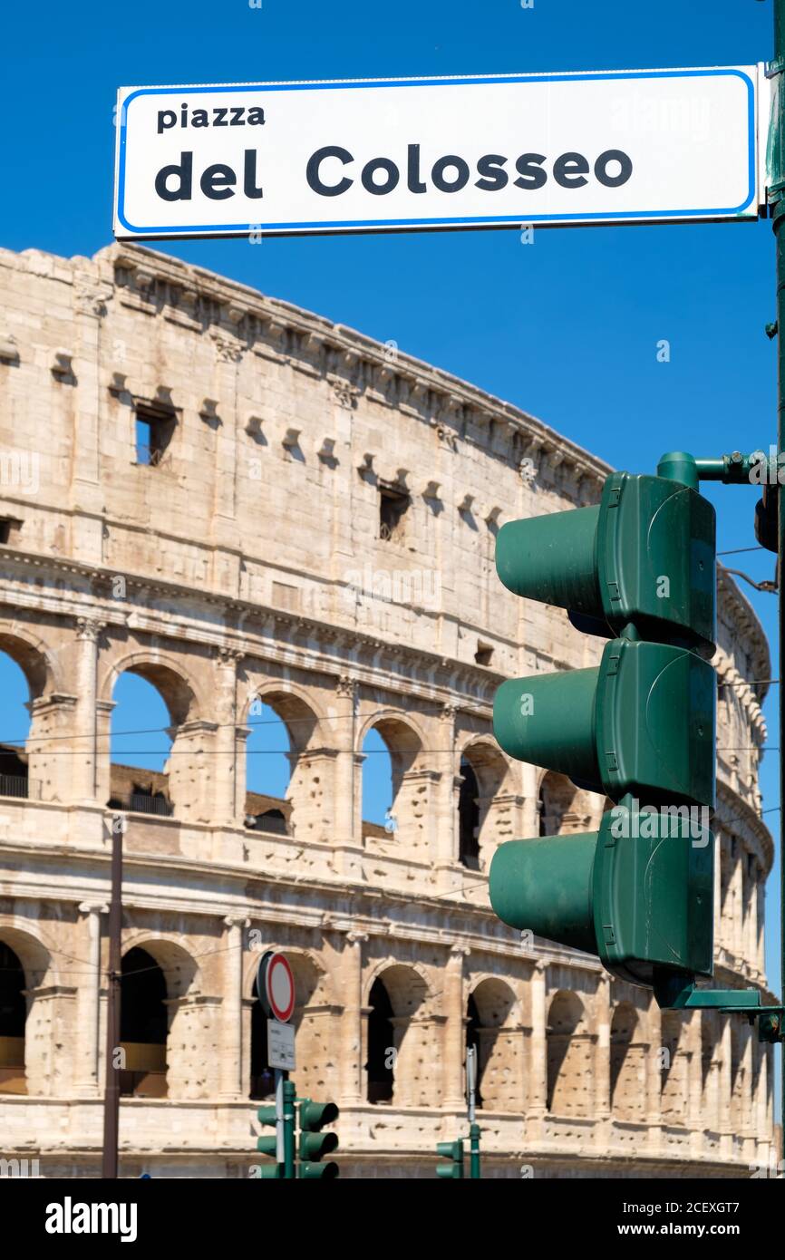 Street sign indicating the direction of the roman Colosseum in central ...