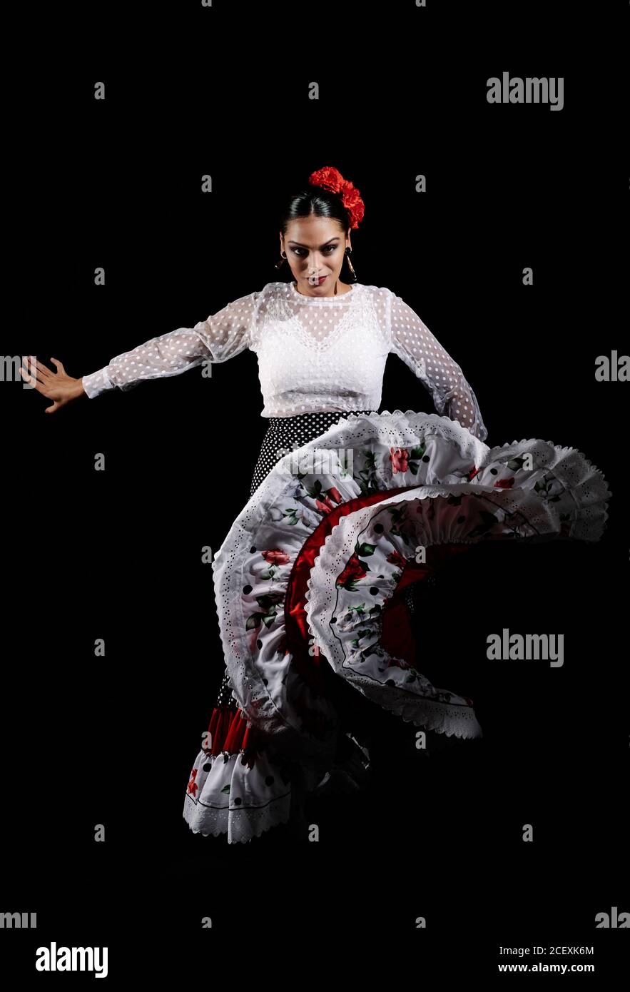 Full body elegant young Hispanic Woman in traditional outfit dancing ...