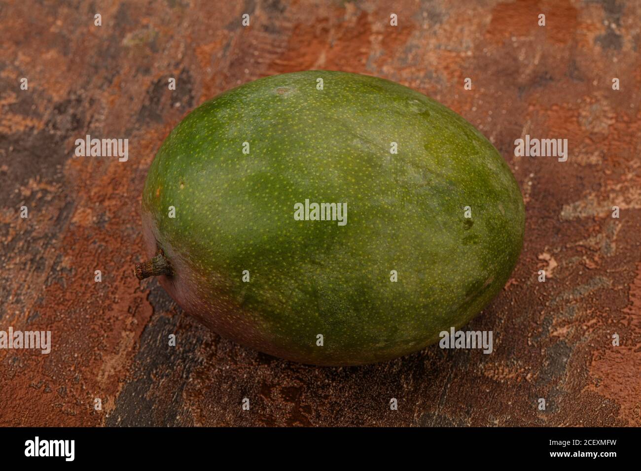 Tropical fruit - Green sweet tasty mango Stock Photo - Alamy