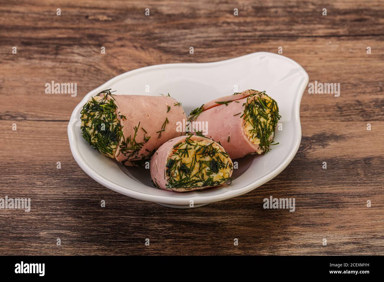 Ham roll snack with cheese and garlic Stock Photo - Alamy