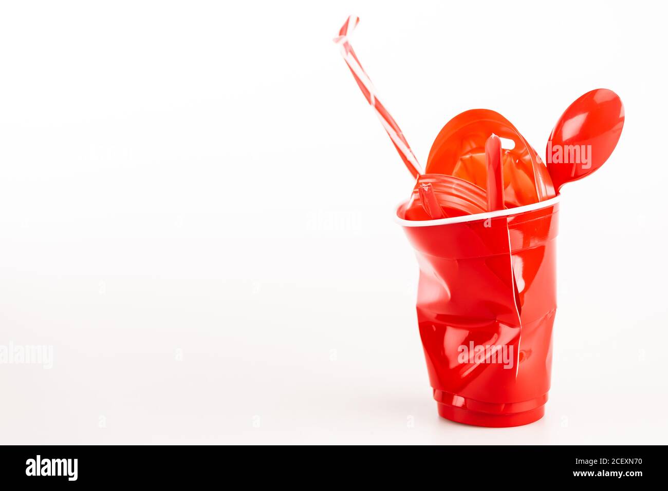 red plastic objects on white background Stock Photo - Alamy