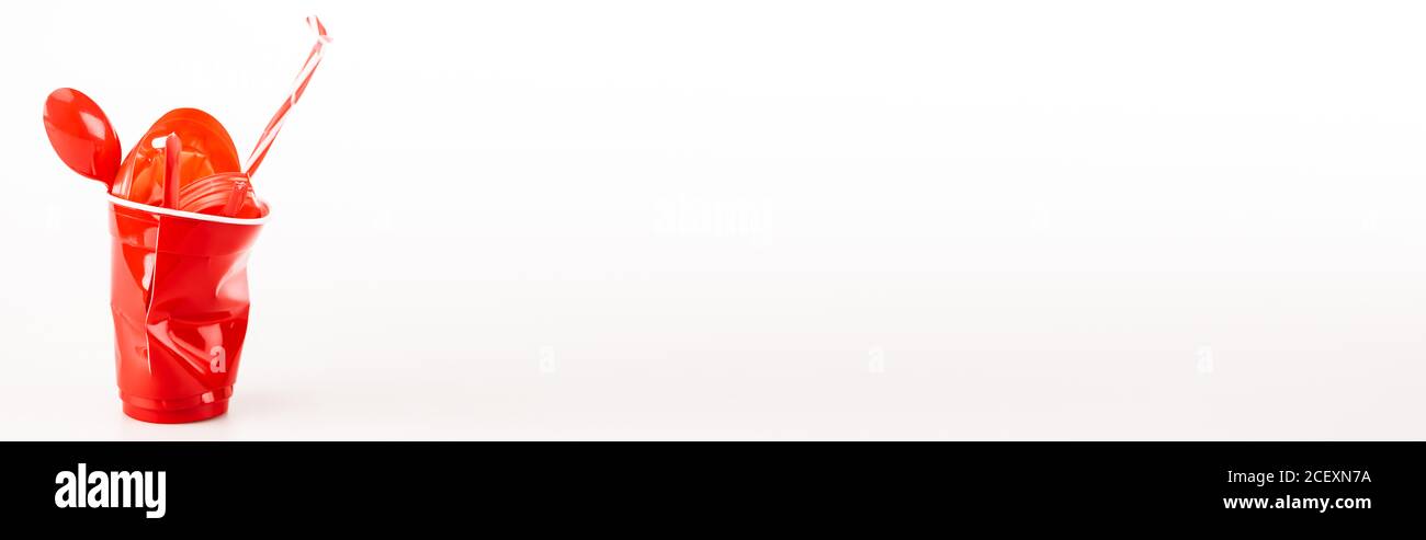 red plastic objects on white background, panoramic shot Stock Photo - Alamy