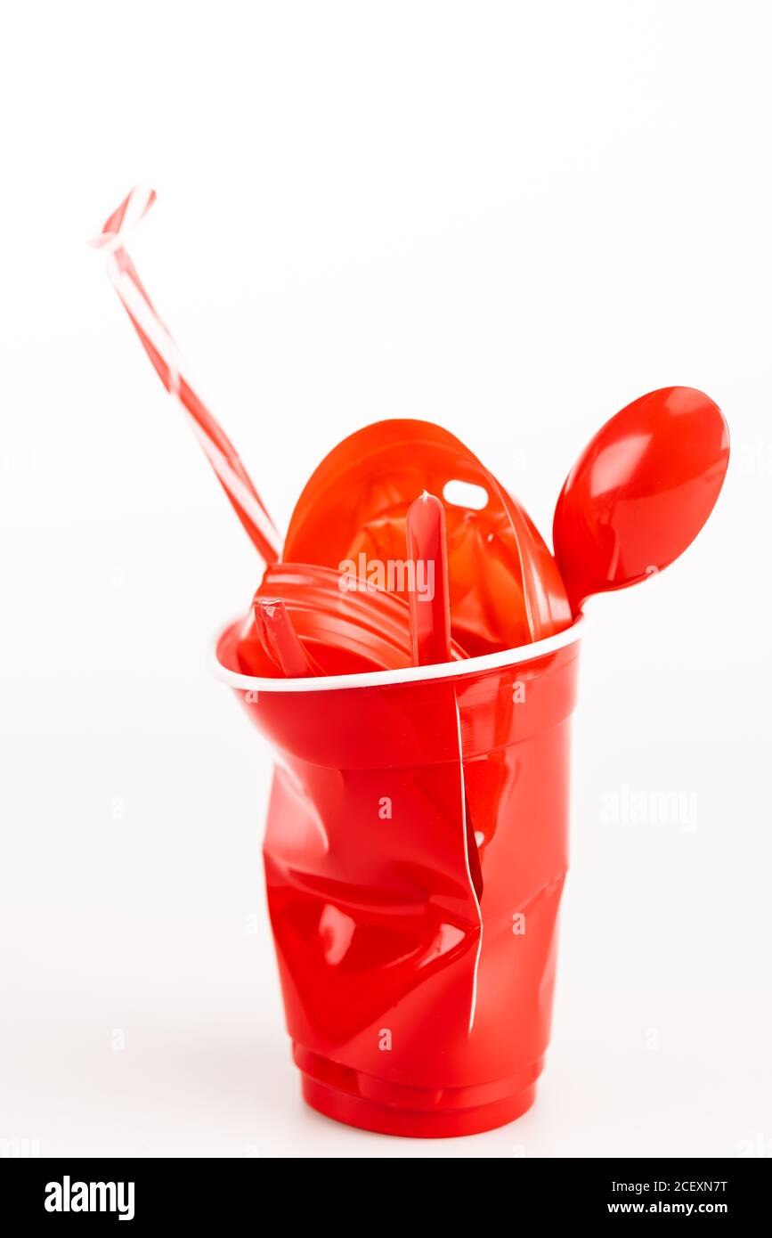 red plastic objects on white background Stock Photo - Alamy