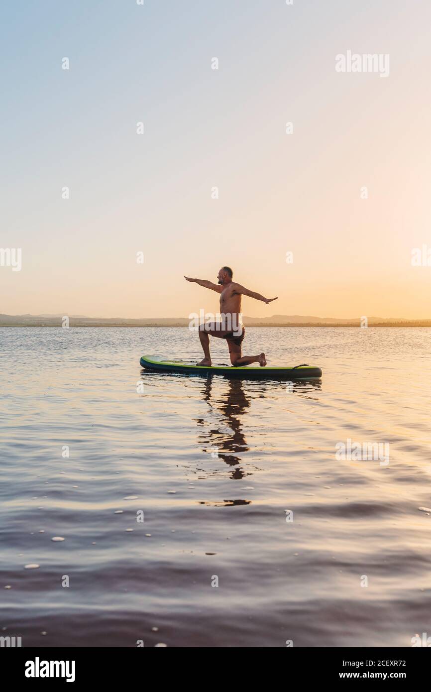 Crescent lunge on the knee hi-res stock photography and images - Alamy