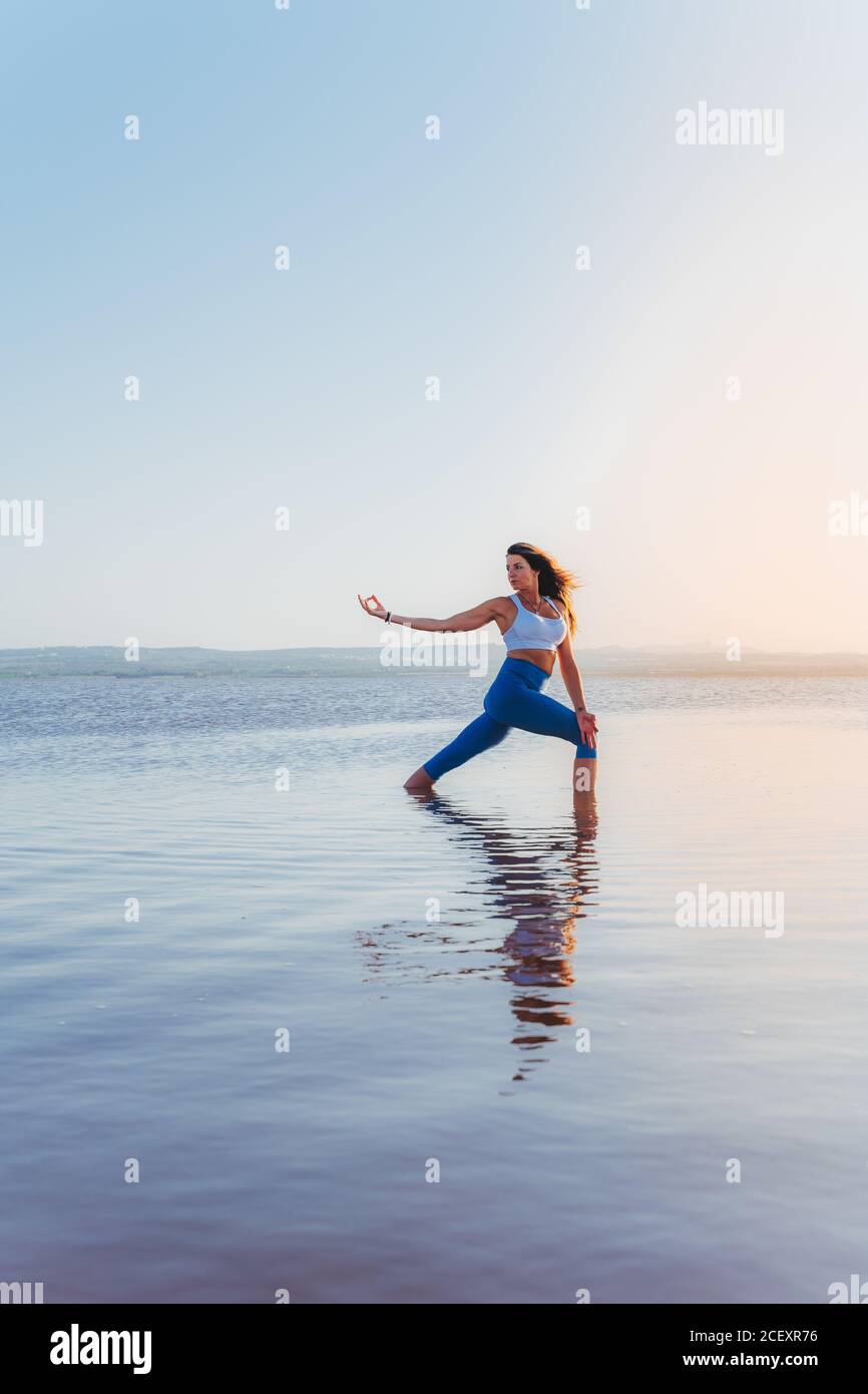 Twisted body side pose hi-res stock photography and images - Alamy