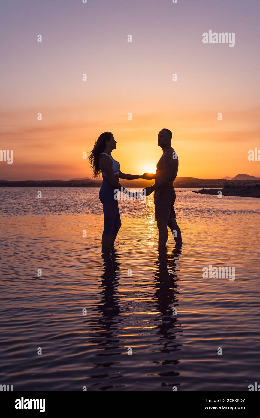 Anonymous woman and man silhouette hi-res stock photography and images ...