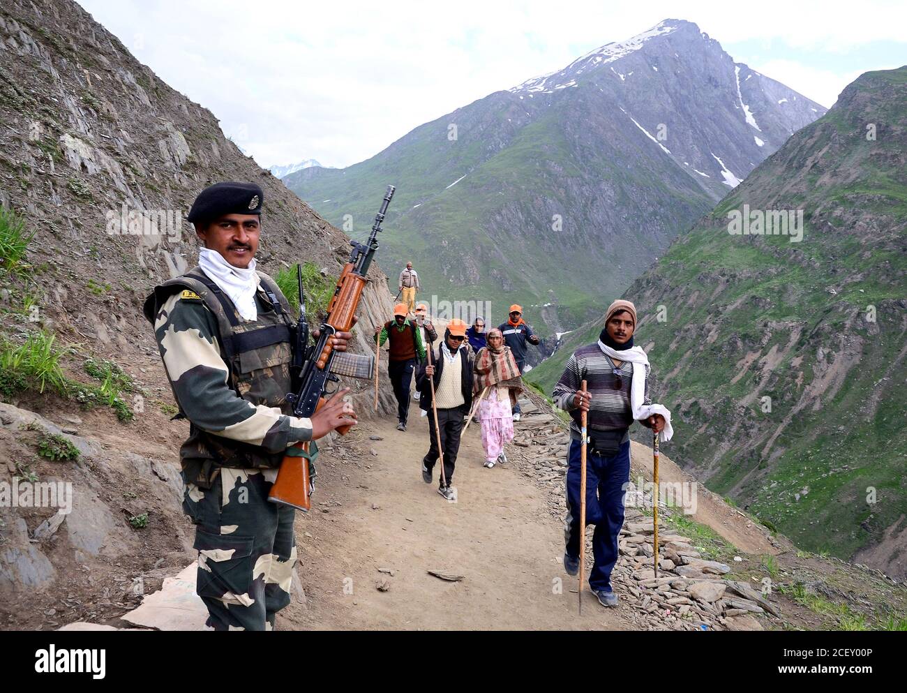 Hindu devotees visit during their pilgrimage from Baltal Base Camp to ...