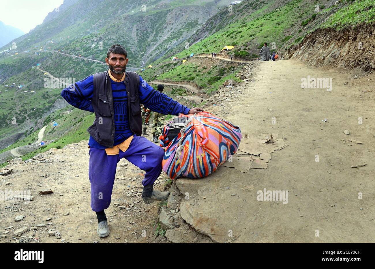 Hindu devotees visit during their pilgrimage from Baltal Base Camp to ...