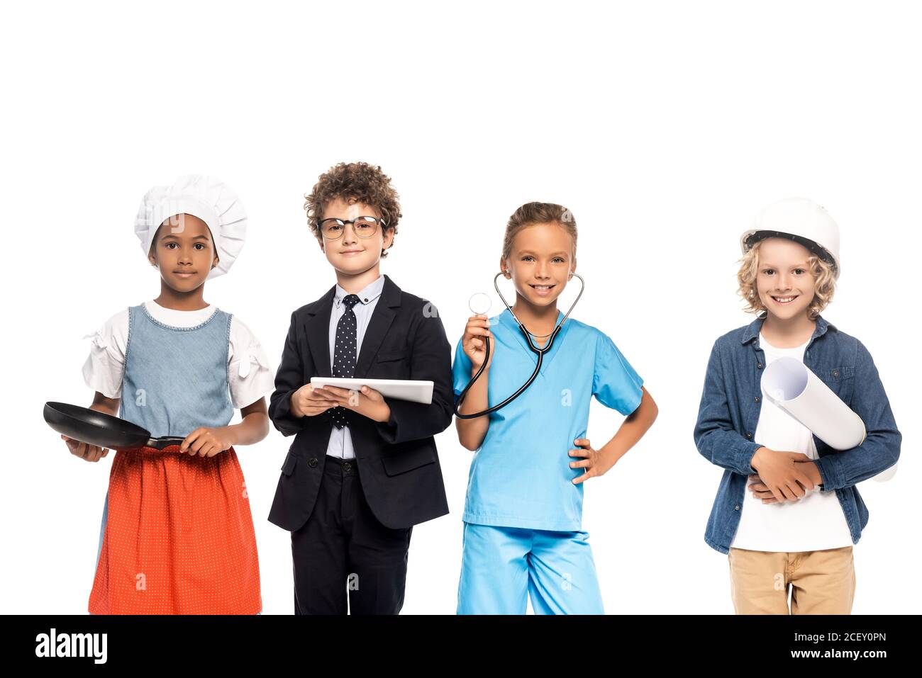 multicultural kids dressed in costumes of different professions holding ...