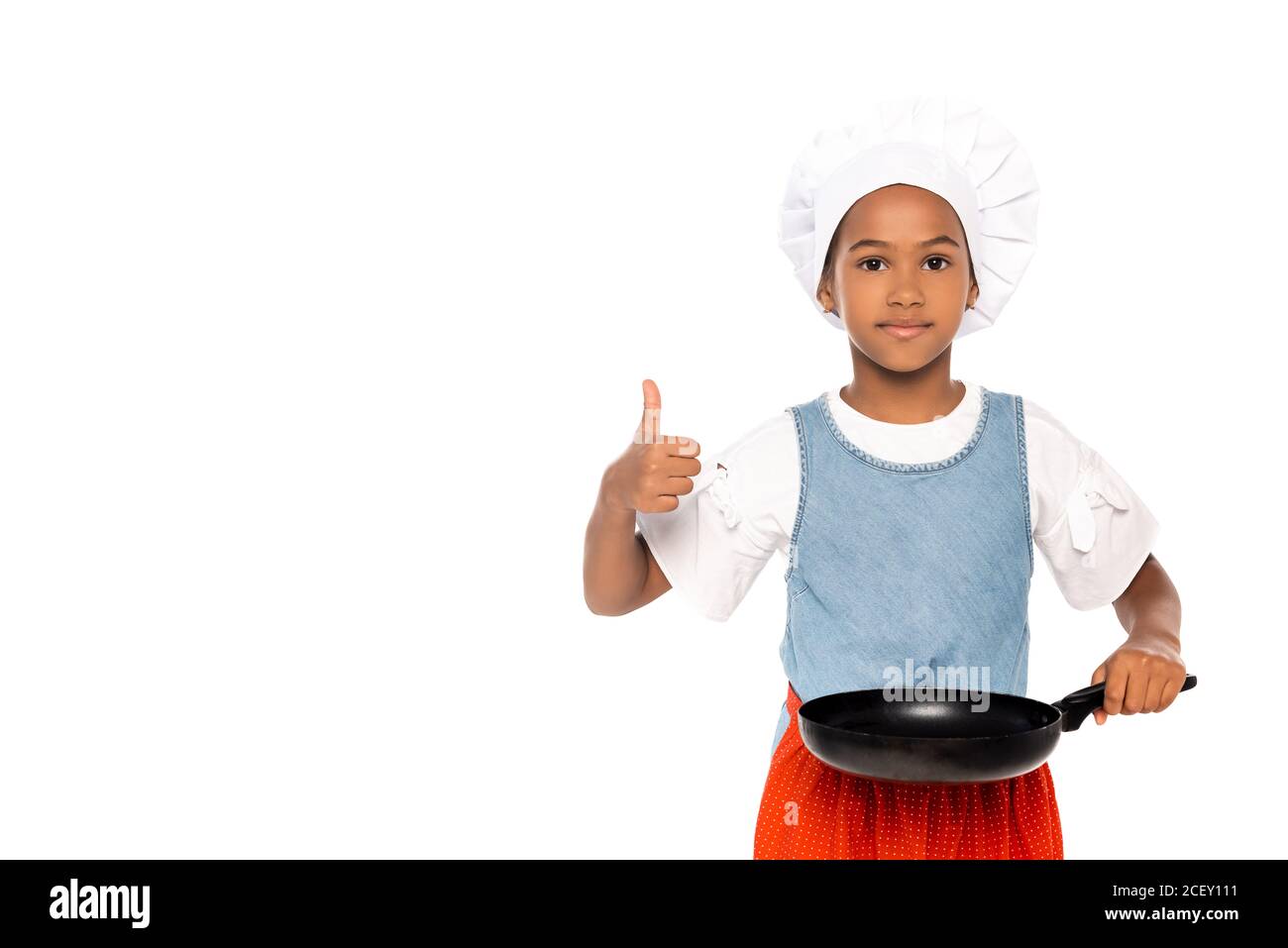 African american kid in costume of chef showing thumb up while holding ...