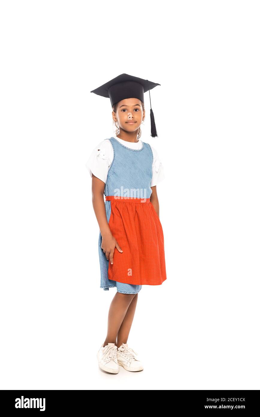 african american kid in graduation cap standing isolated on white Stock ...