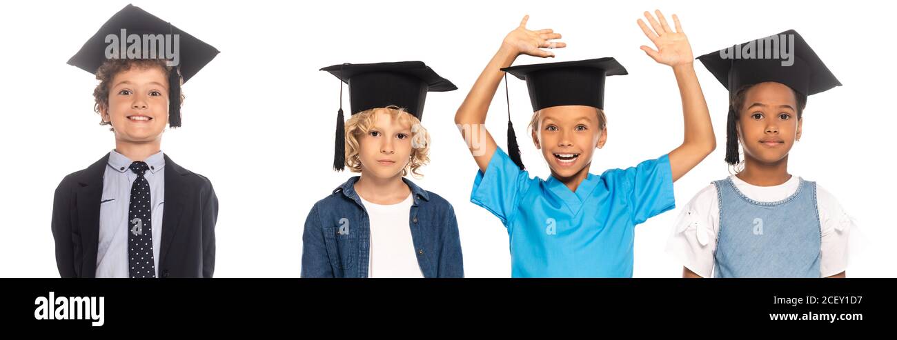 panoramic crop of multicultural kids in graduation caps dressed in ...