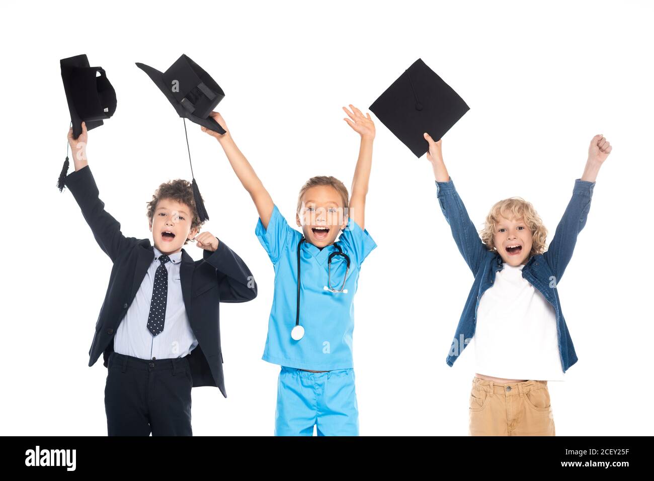 excited children dressed in costumes of different professions holding ...