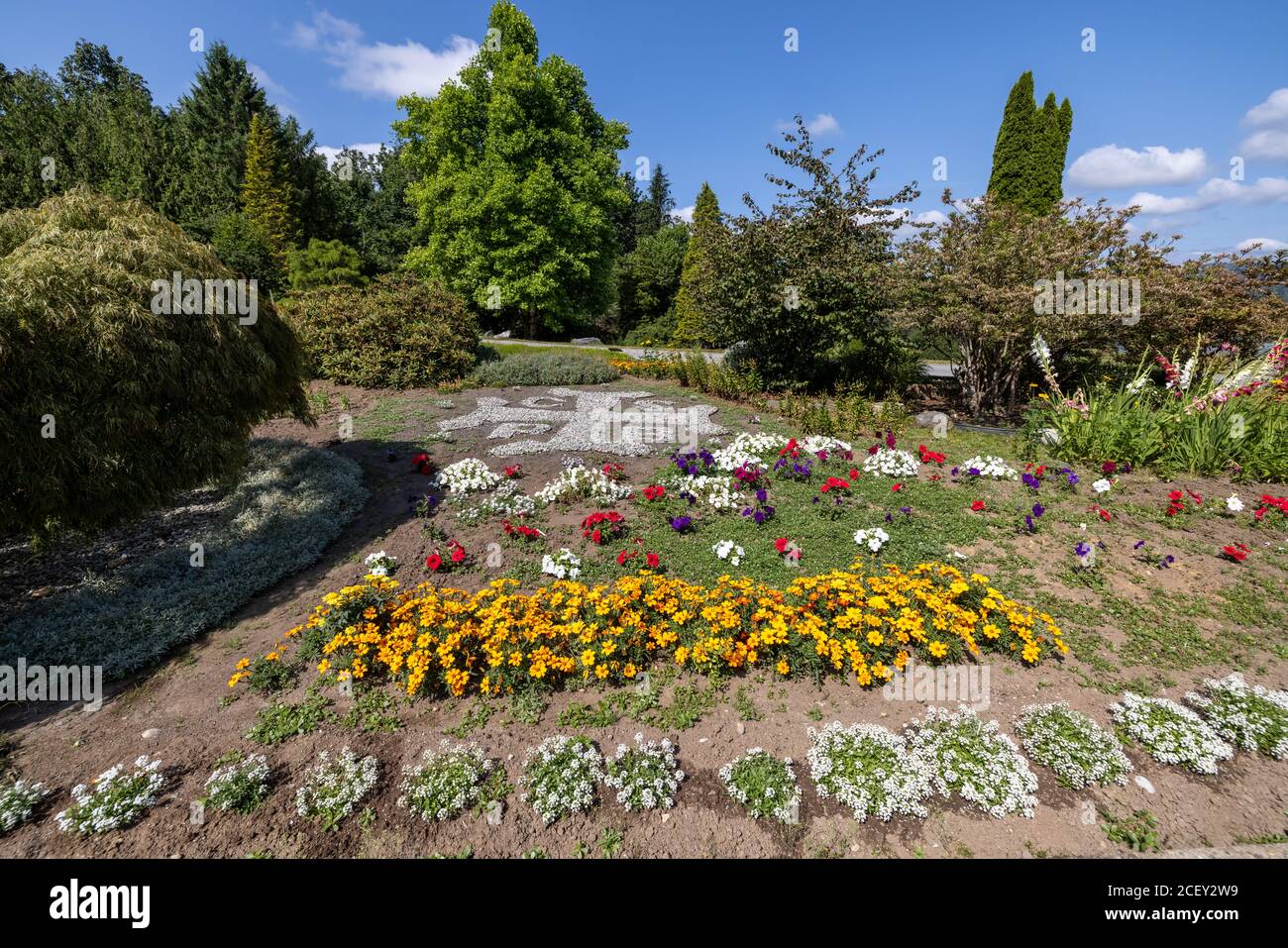 Beautiful Garden on church grounds Stock Photo - Alamy