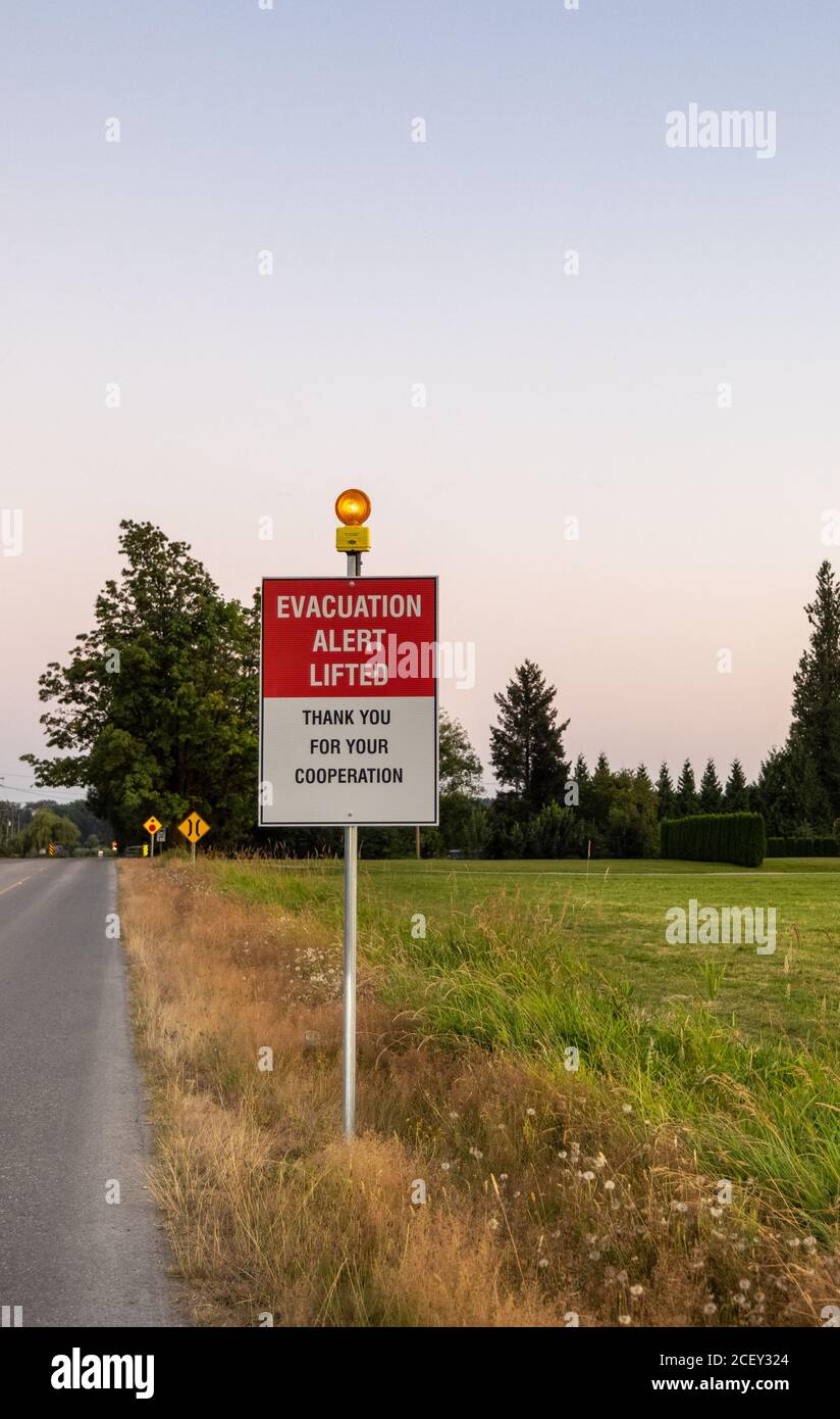 Flooding Over Evacuation Alert Signage Stock Photo - Alamy