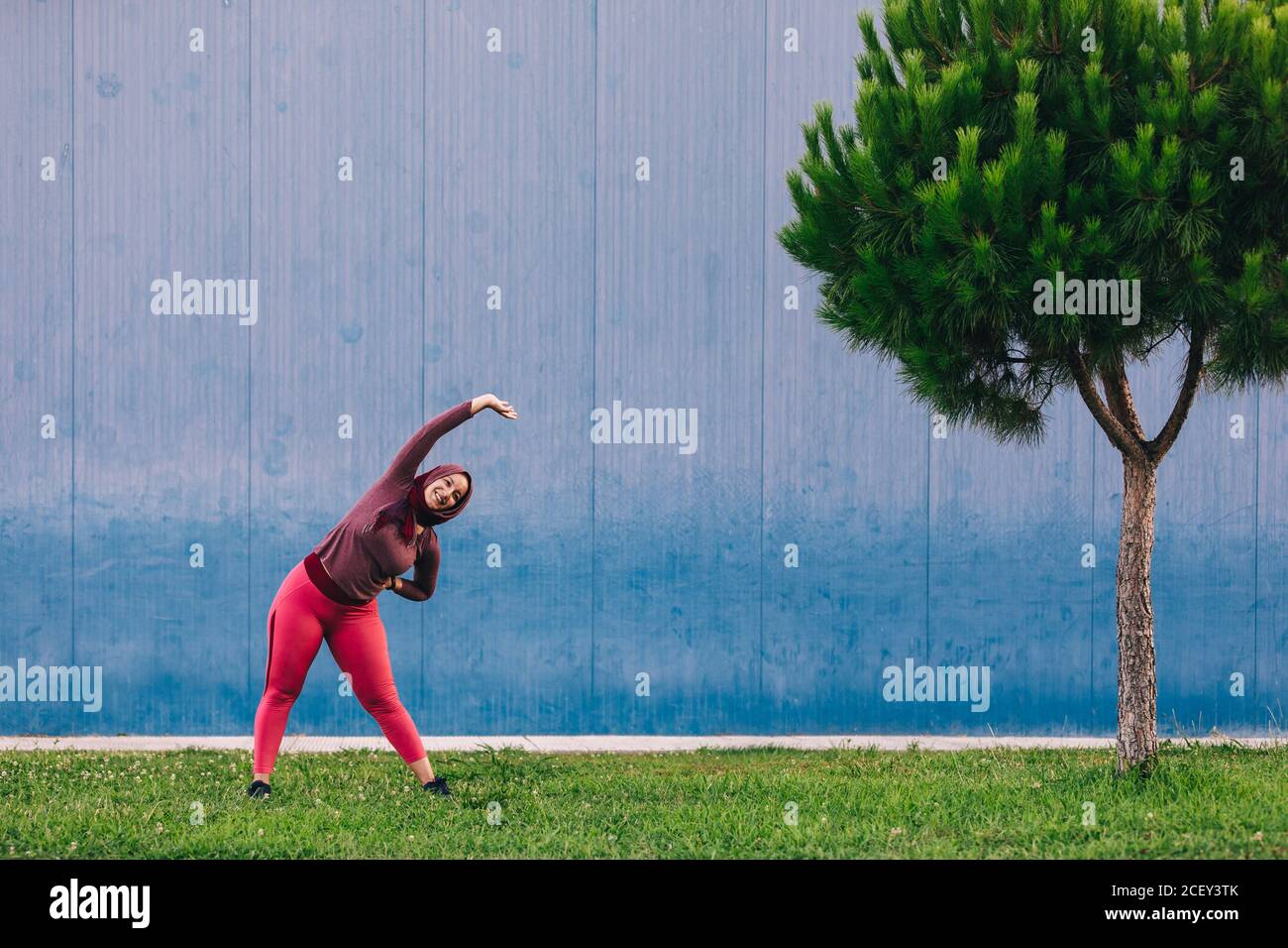 Standing side stretch hi-res stock photography and images - Alamy