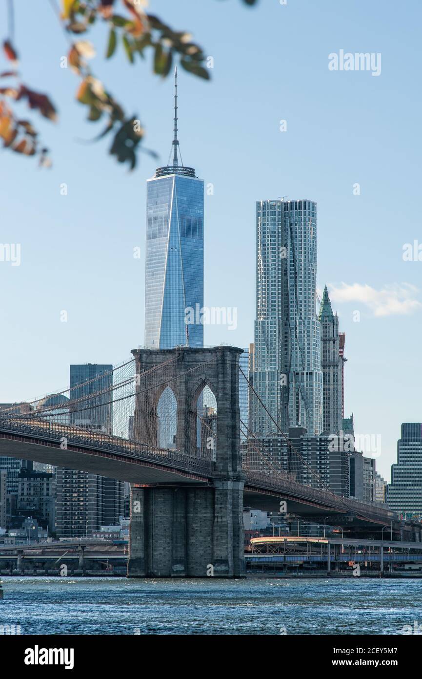 Amazing view of stone Brooklyn bridge crossing river on background of ...