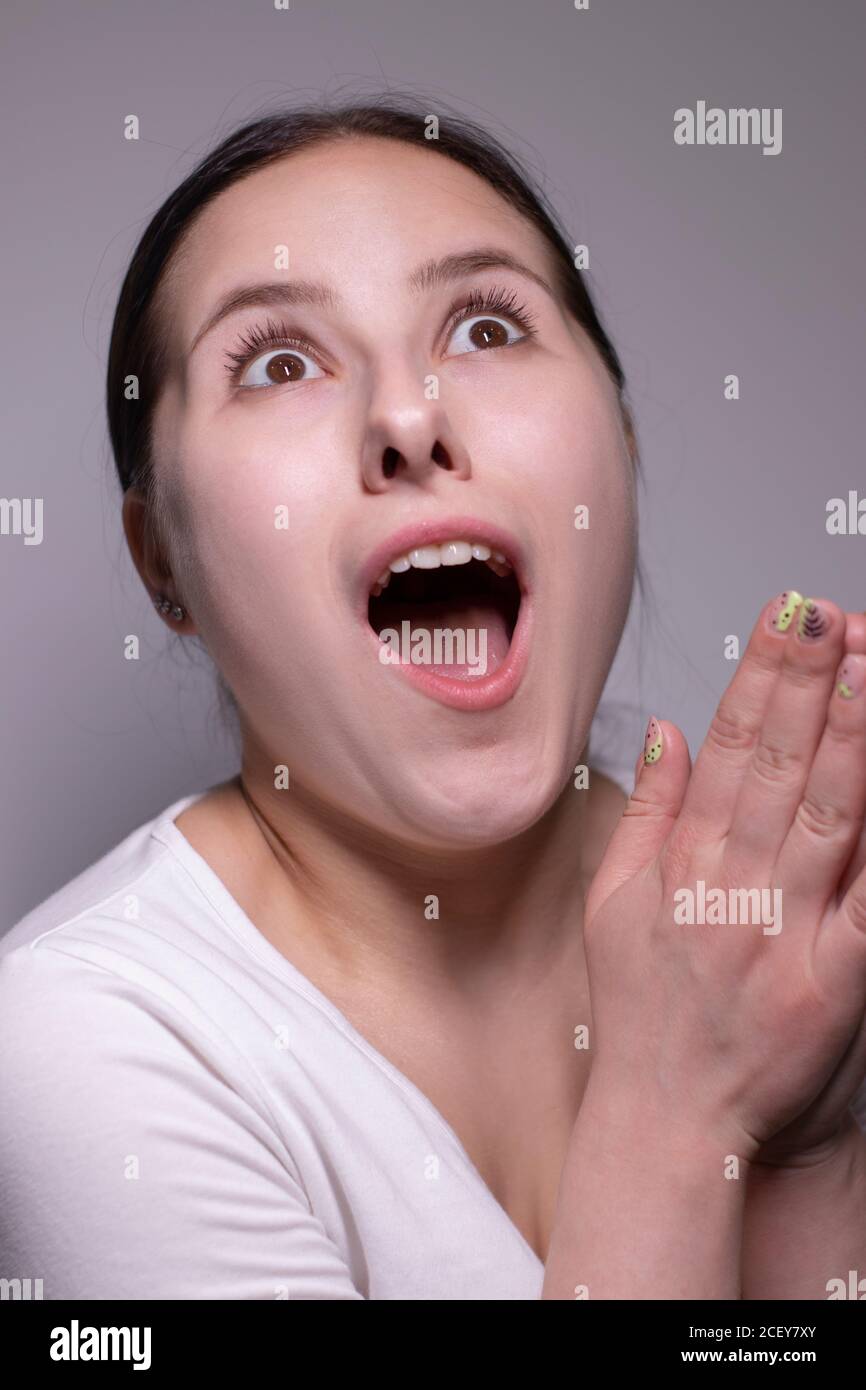 Indoor portrait of Beautiful smiling brunette with clean skin, natural ...