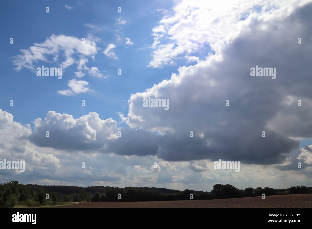 Beautiful clouds in a blue sky over a northern european landscape Stock ...