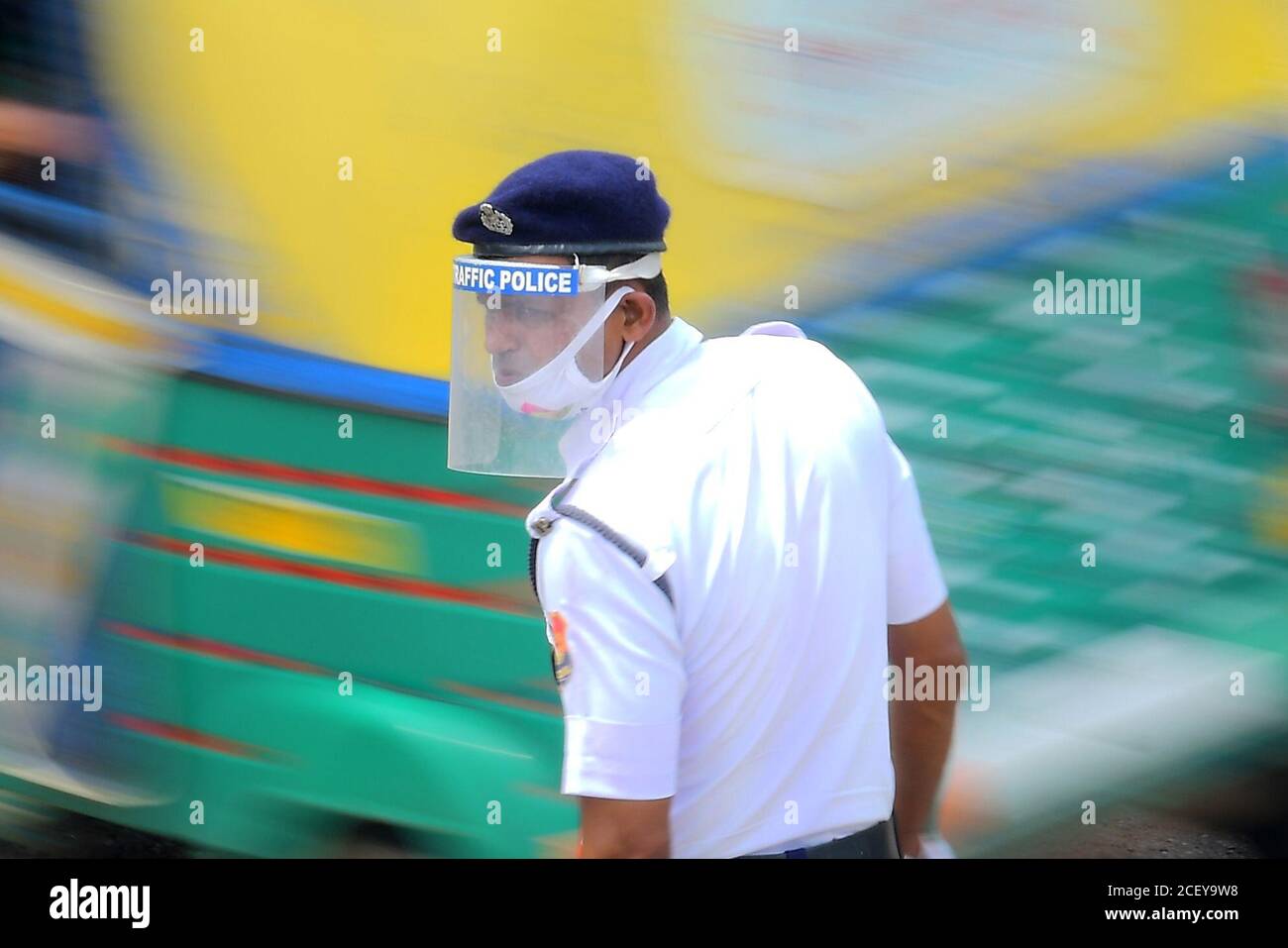 Traffic police on duty with face shields and masks during the COVID-19 ...