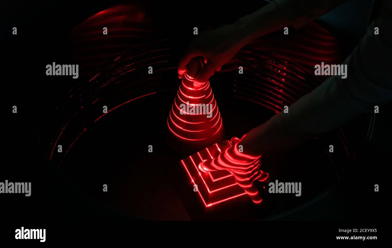 Interactive exposition in science museum - optical illusion with red ...