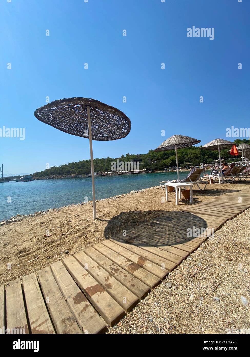 front view sun umbrella and shadow Stock Photo - Alamy