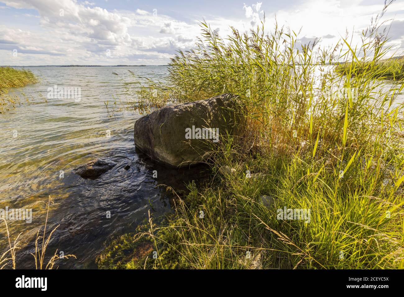 View of rocky coast and waves Baltic sea near big rock. Beautiful nature landscape backgrounds ...
