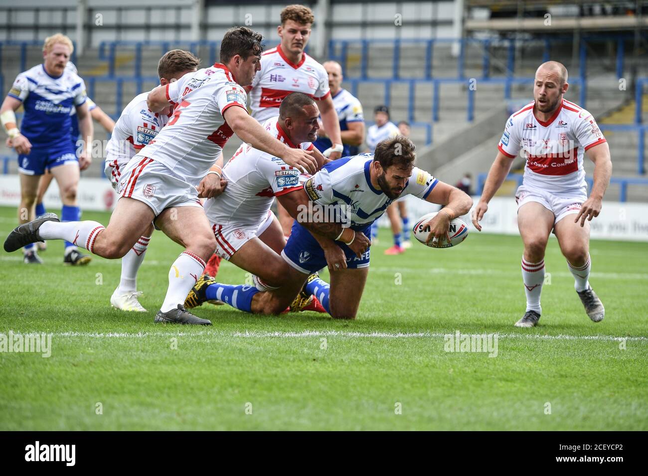 St Helens' Alex Walmsley breaks through to score try Stock Photo - Alamy