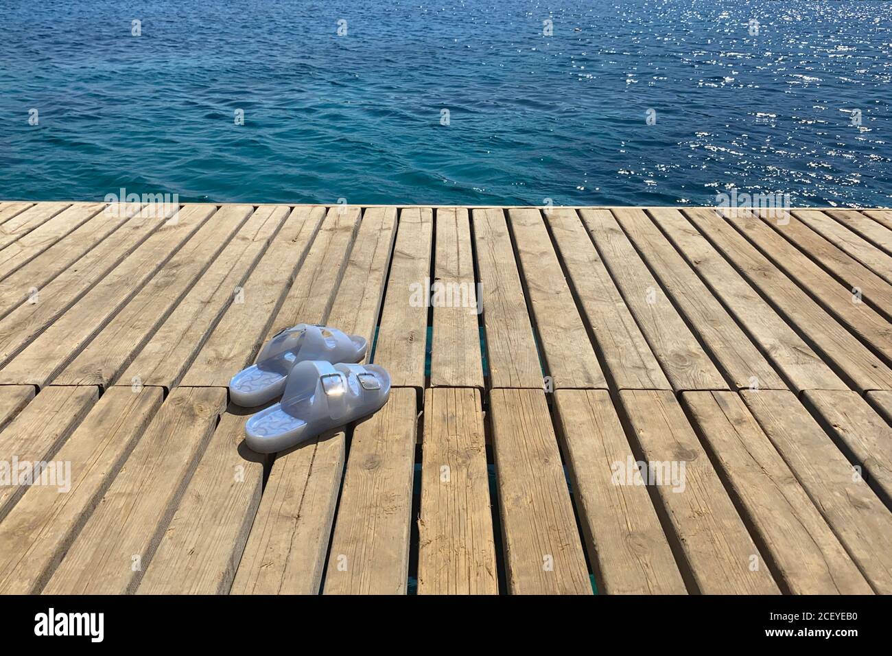 Beach slippers hi-res stock photography and images - Alamy