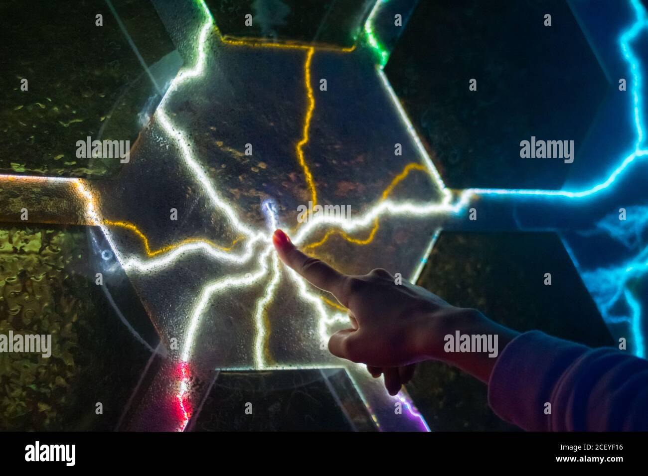 Electricity, education, science, futuristic and physics concept. Woman ...