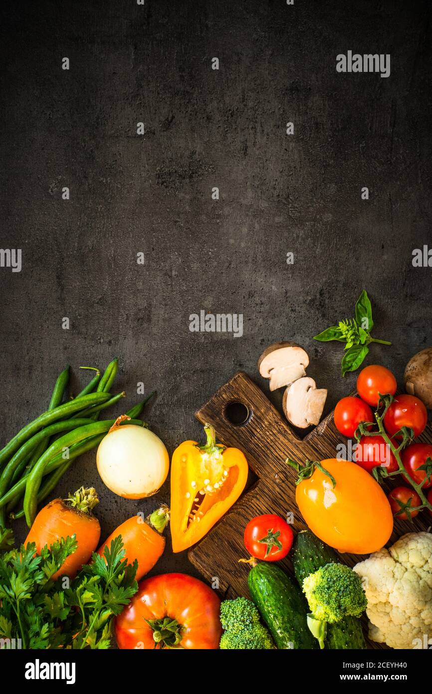 Healthy food background on black table Stock Photo - Alamy