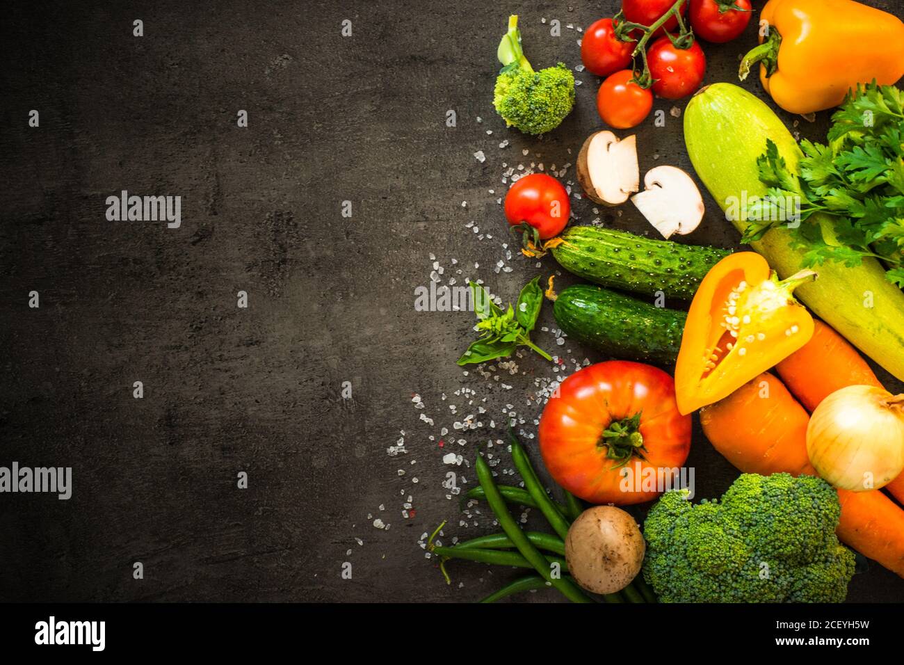 Healthy food background on black table Stock Photo - Alamy