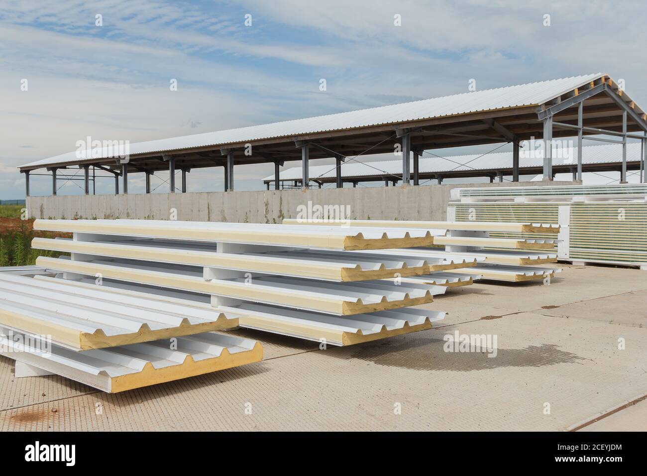 Metal frame of the building with a sandwich panel of insulation on the ...