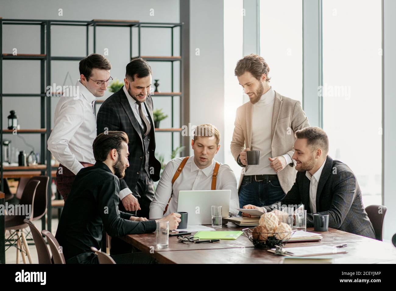 happy, positive business crew consisted of smiling men coworking in ...