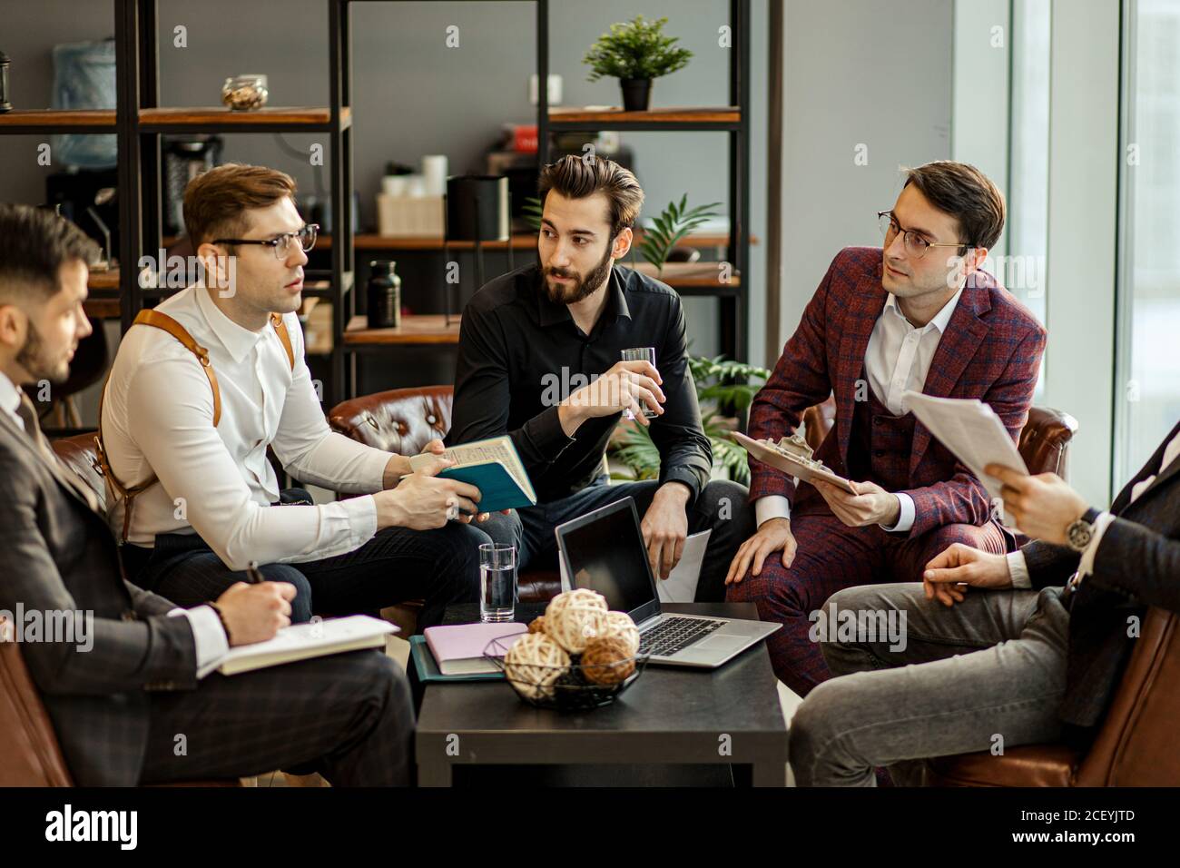 Men only meeting table suits hi-res stock photography and images - Alamy