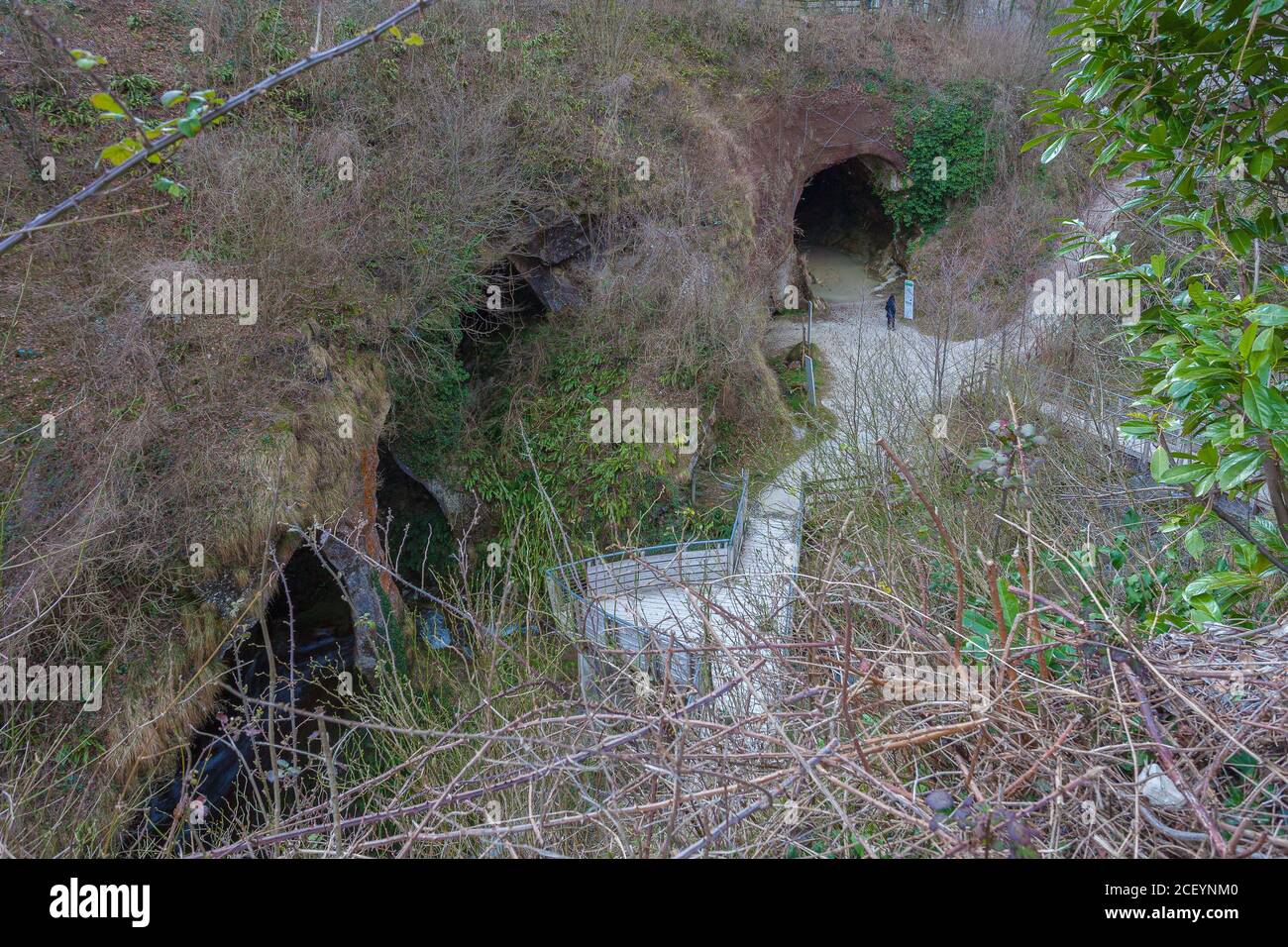 Panorama on the entrances of the caves excavated in sandstone. Top view ...