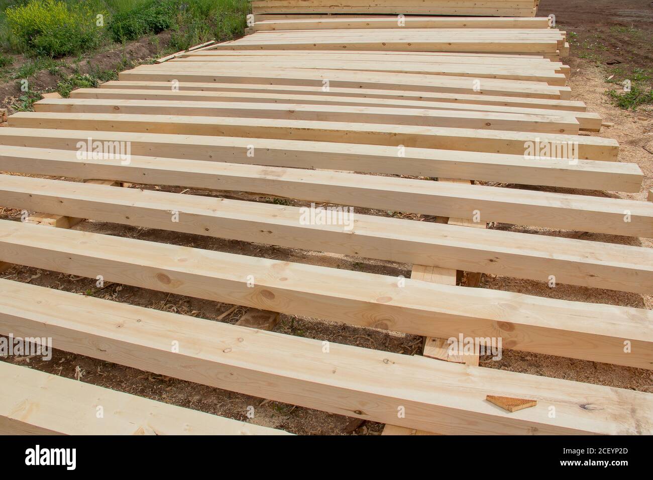 Stack of wooden squared beams for construction. Material for the ...