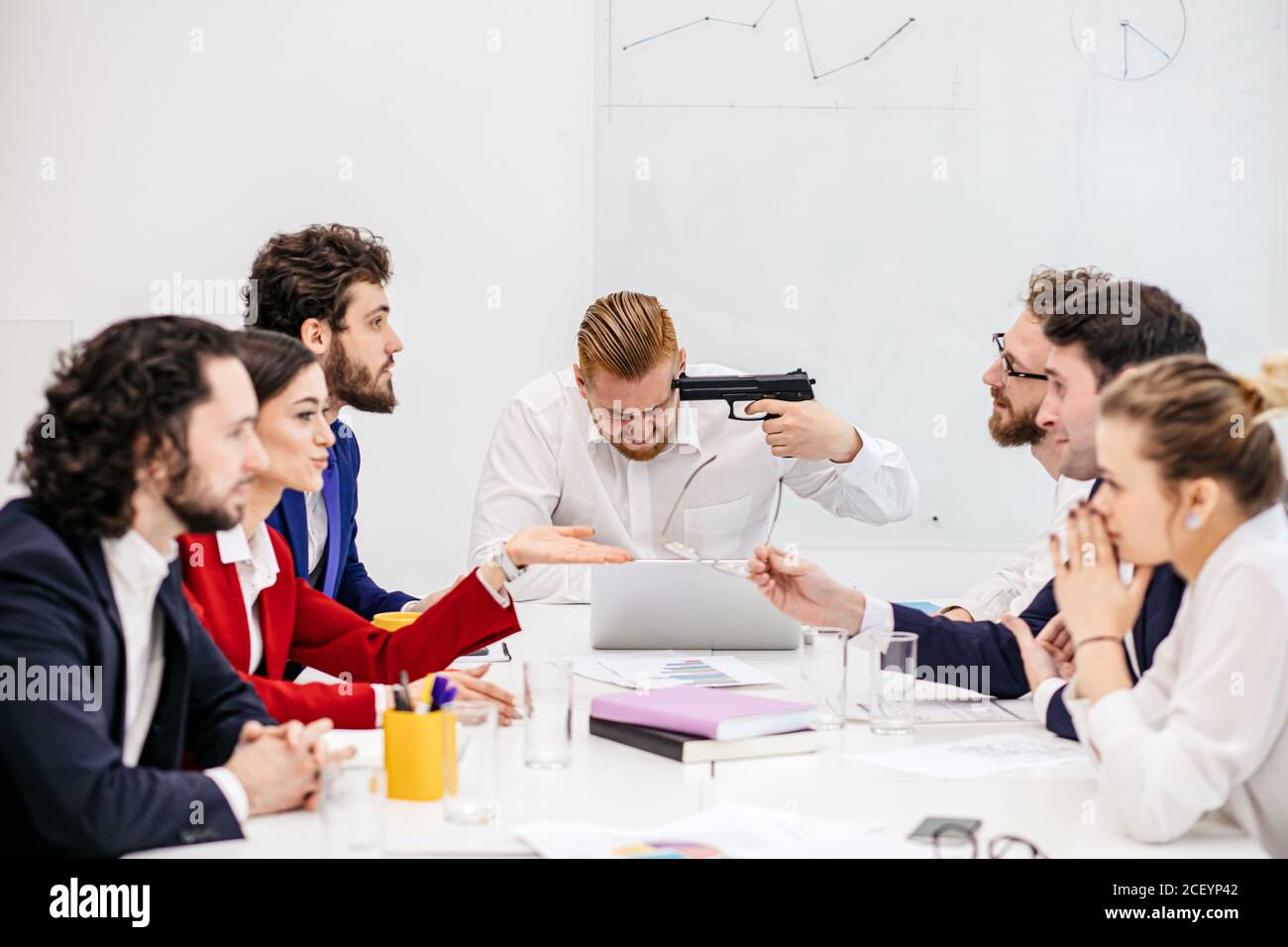 Portrait of young caucasian business man looking depressed and worried ...
