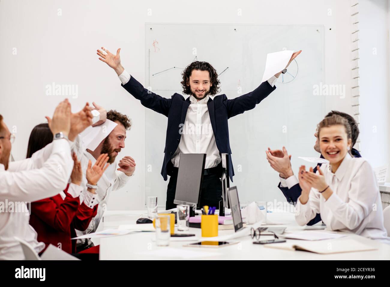 happy and cheerful business team happy after successful realization of ...