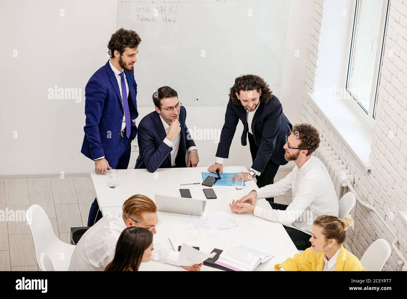 top view on business meeting of caucasian young people, successful team ...