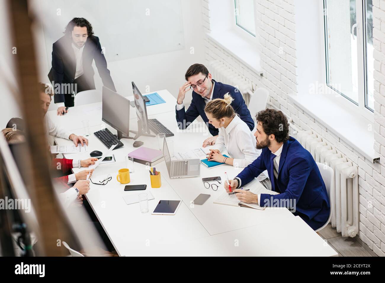 business co-working of friendly team in office, wearing formal wear ...