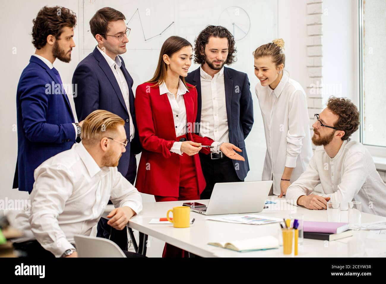 business meeting of friendly successful team in boardroom, active and ...