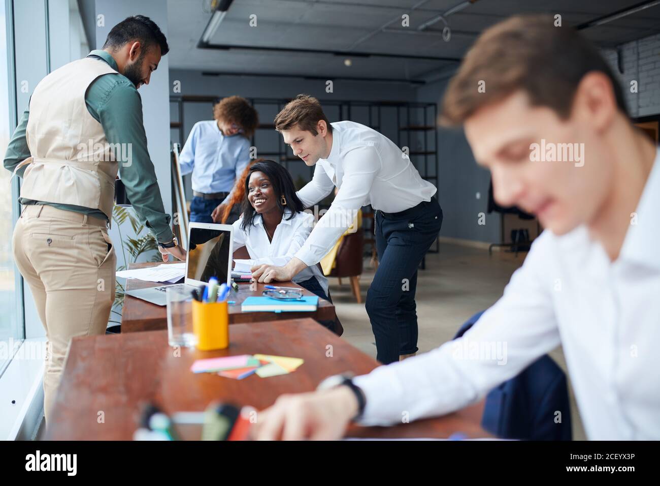 Team work process in modern office using papers. Analyze plans for ...
