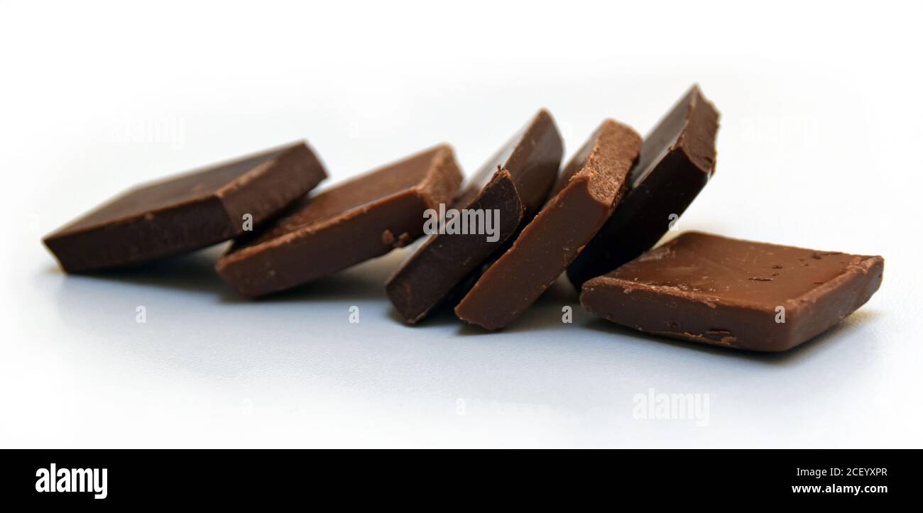 Chocolate cubes isolated on white background. Close-up view. Sweet ...