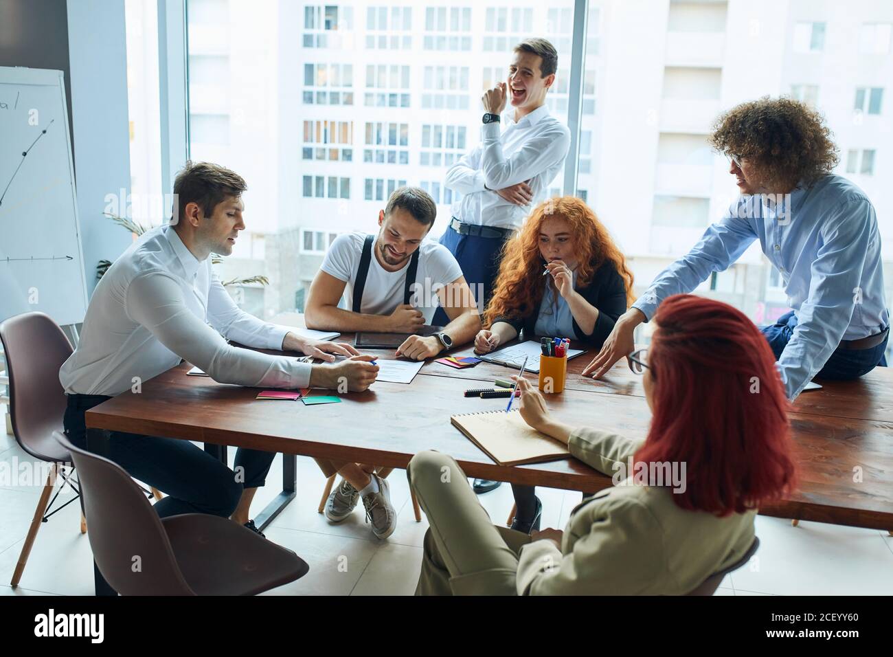 Relaxed, friendly and casual atmosphere at the conference hall, team ...