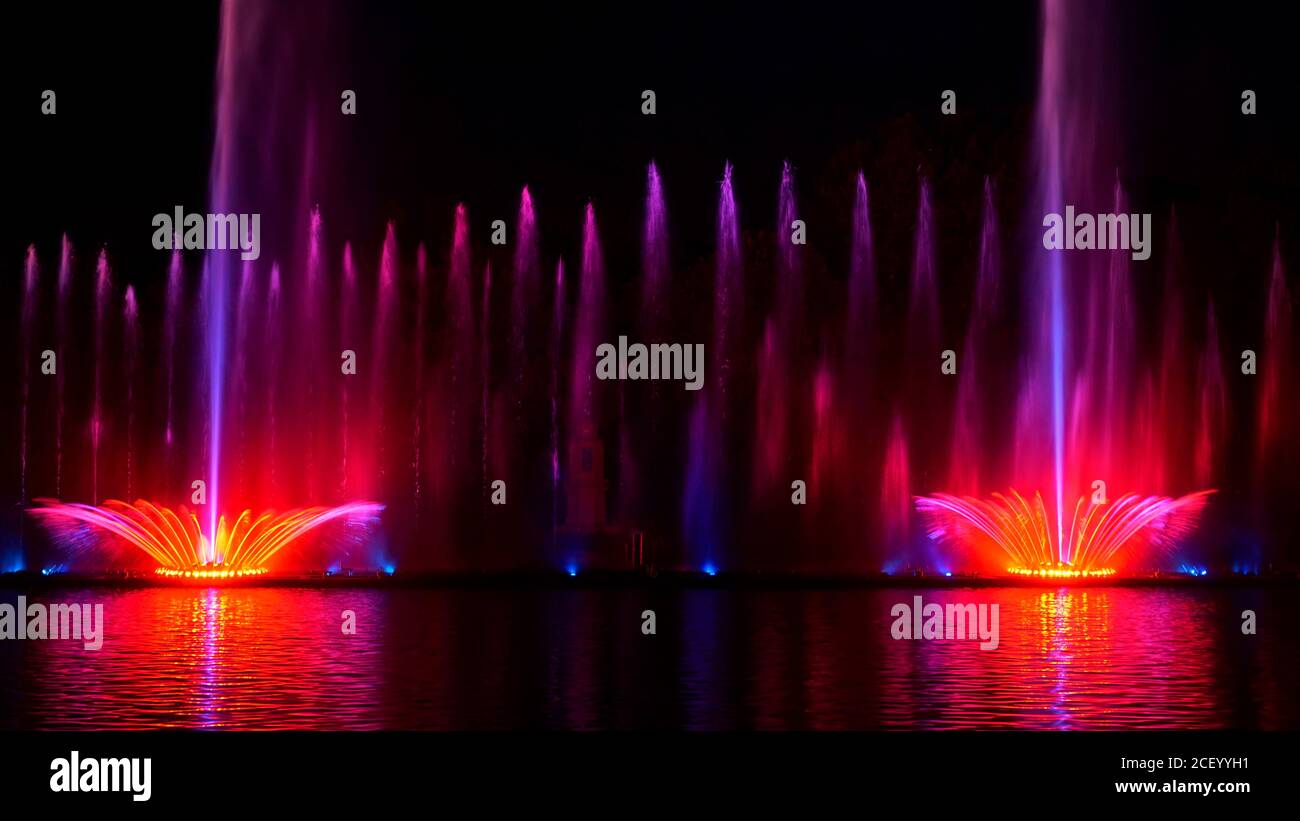 Night laser fountain show, on the Roshen embankment, the Ukrainian city ...