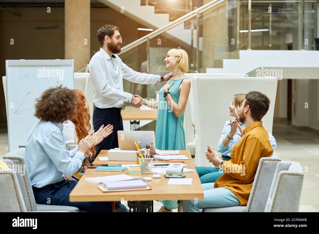 Impressed satisfied man with thick beard and optical spectacles, gives ...