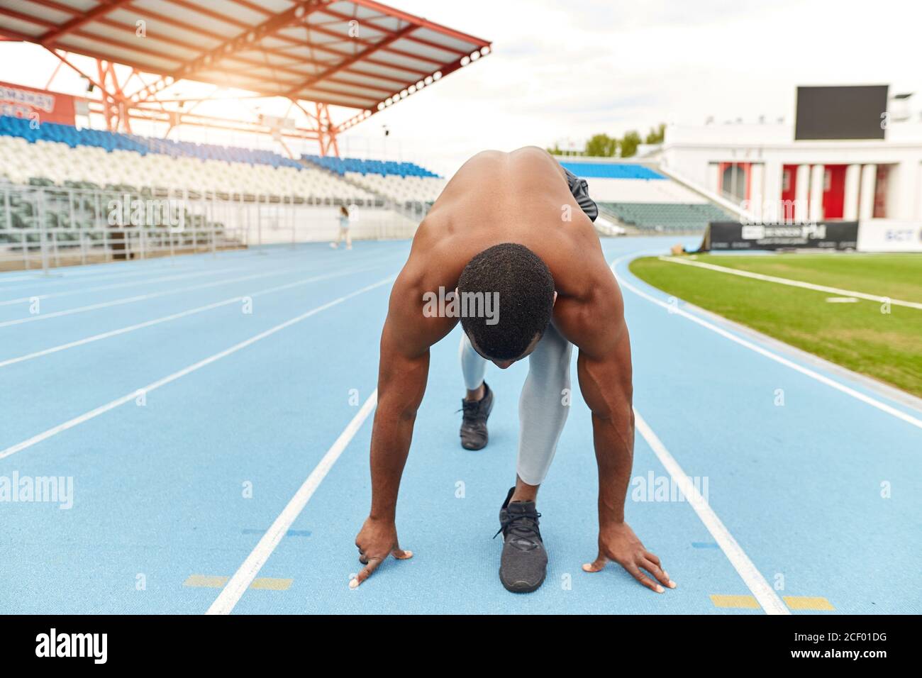 ready, steady , go. sportsman waiting for signal to run, full length ...