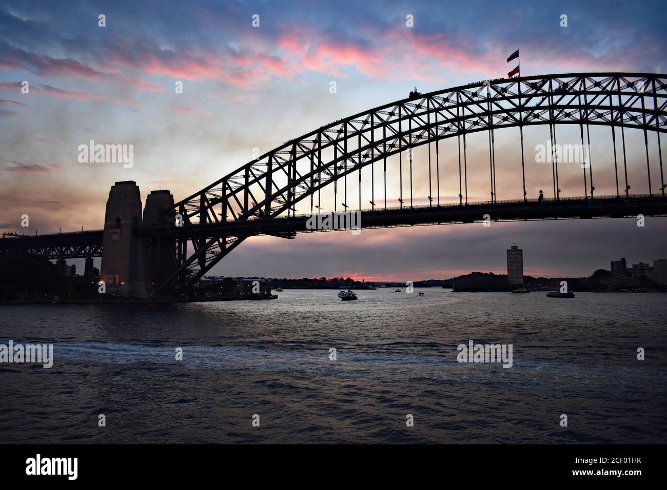 Sydney Harbour Bridge and Blues Point tower at sunset. Beautiful sunset ...